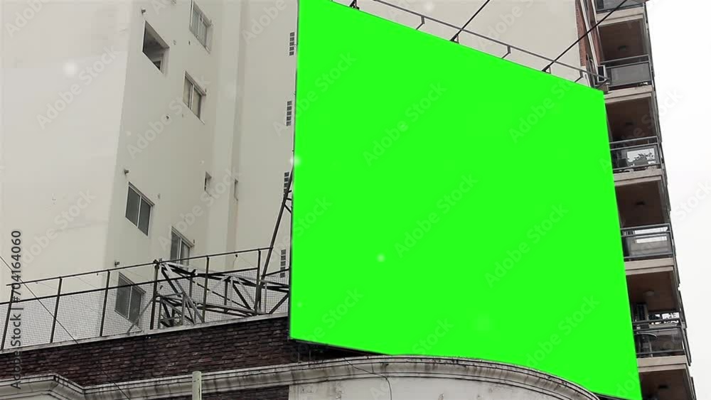 A Large Billboard Green Screen On An Ancient Building. You can replace ...