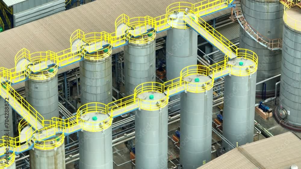 A bustling lubricant plant, churning out essential oils and greases ...