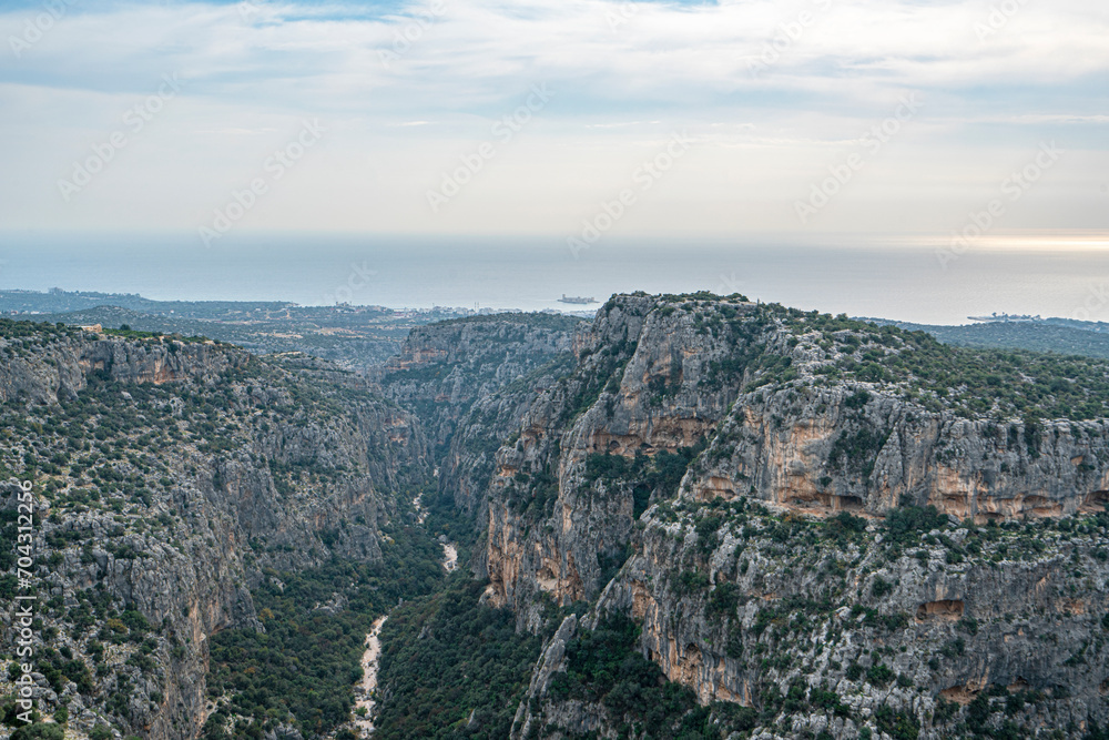 Adamkayalar (literally "man-rocks") is a location in Mersin, Turkey ...