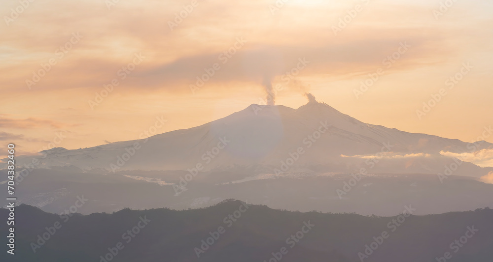 mysterious landscape of great erupting volcano with smoke from craters ...