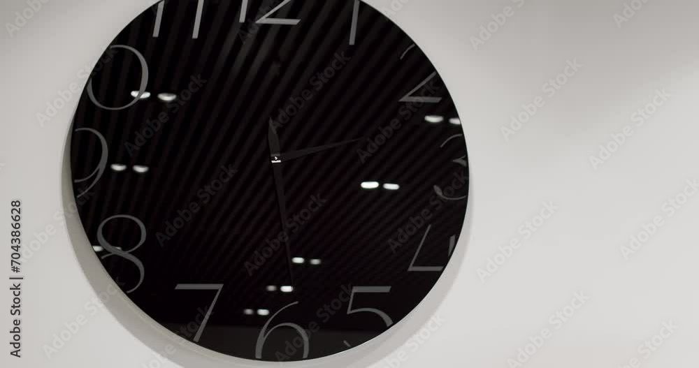 Vidéo Stock Modern Modern and Minimalist black watch on the wall a ...