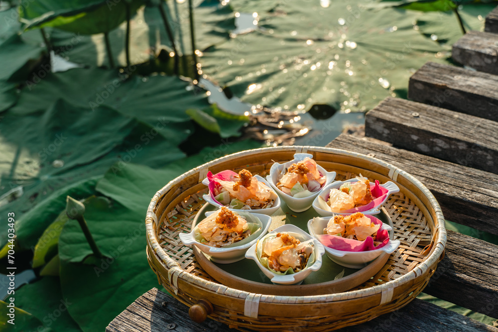 Miang Kham lotus petals-wrapped is a food that people is eaten as a ...