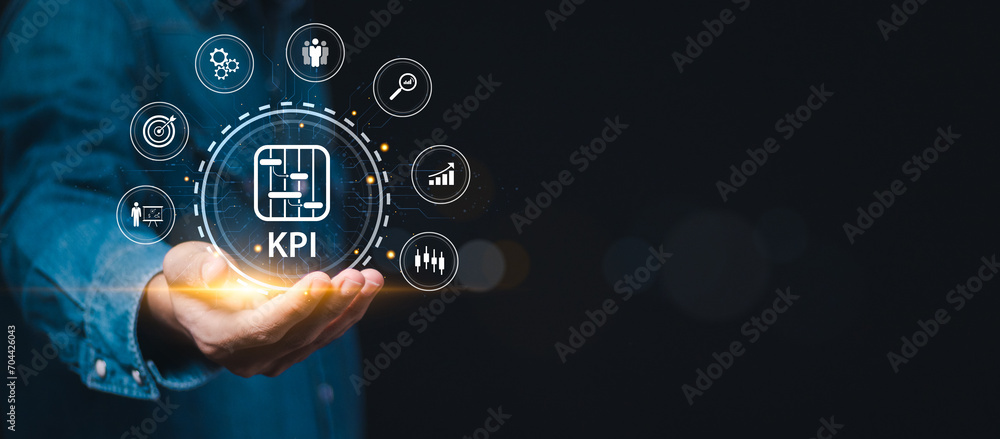 KPI, business performance indicators, Businessman holding with data ...
