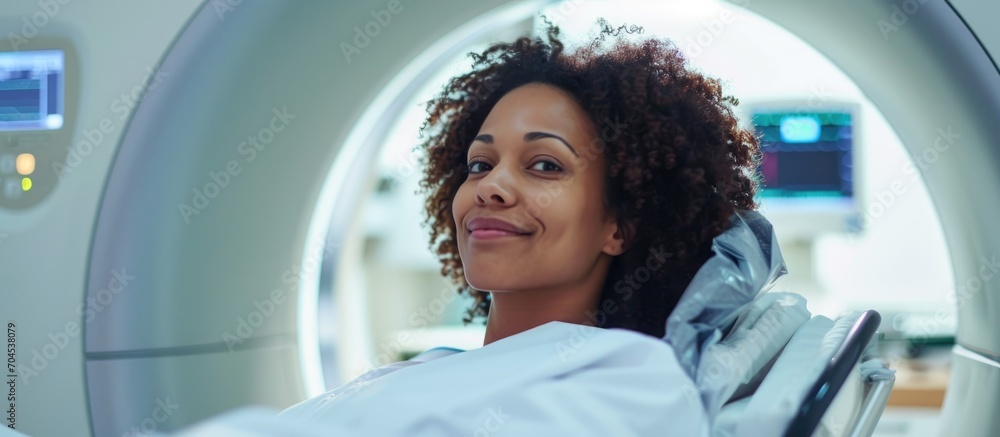 Female patient undergoing medical imaging procedure controlled by ...