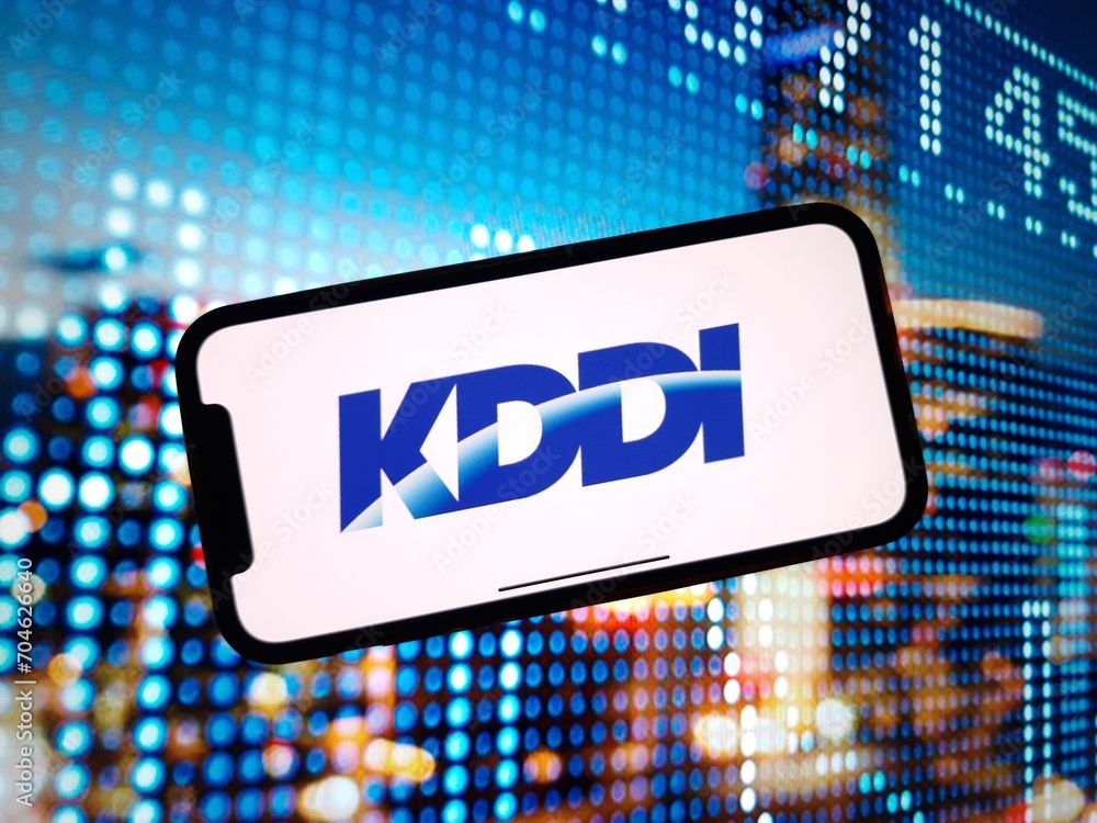 Konskie, Poland - January 07, 2024: KDDI company logo displayed on mobile phone Stock Photo ...
