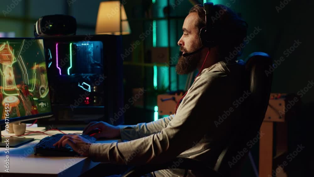 Man plays first person shooter videogame with internet teammates ...