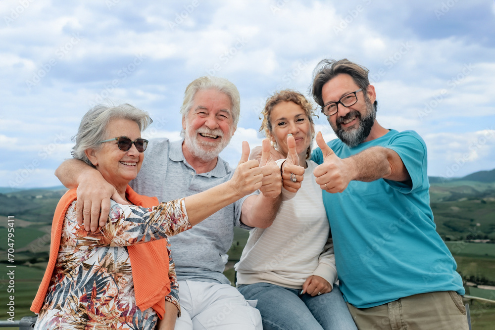 Happy multi generation family having fun together on outdoor ...