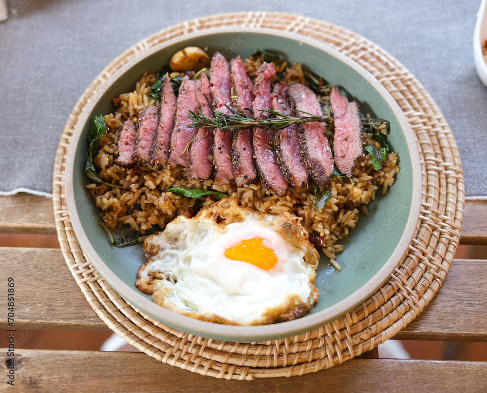 Spicy basil fried rice served with grilled Medium Rare beef and ...