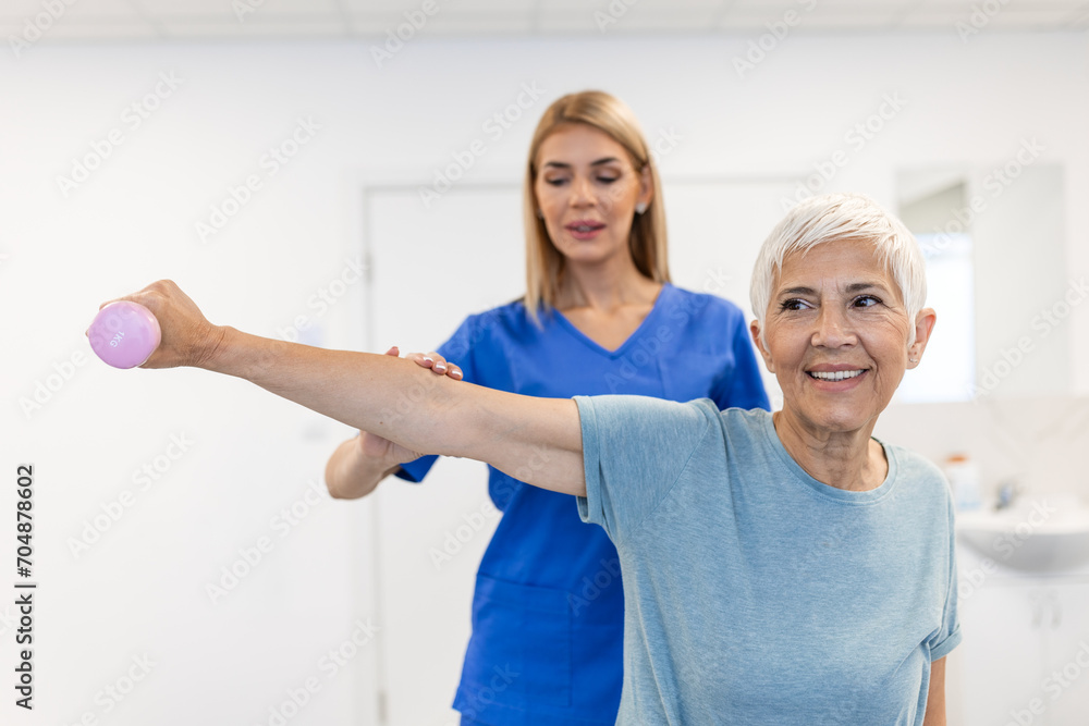 Professional therapists is stretching muscles, senior patient with ...