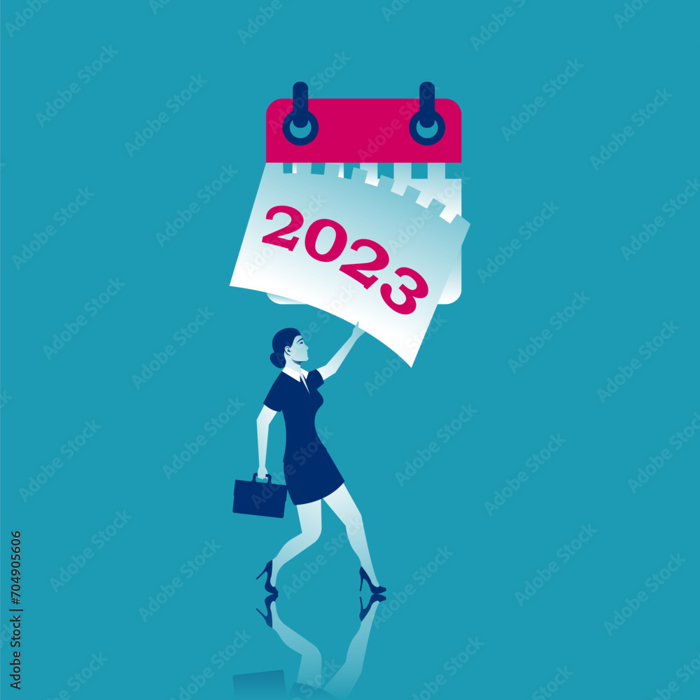 Goodbye 2023. Woman tears off a calendar sheet of the outgoing year ...