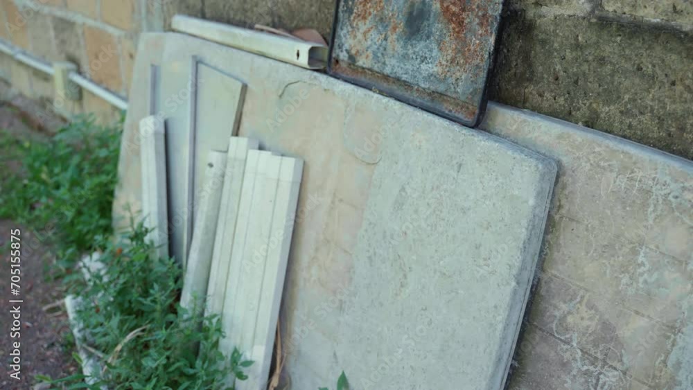 Demolished construction waste ready for disposal, cement blocks ...