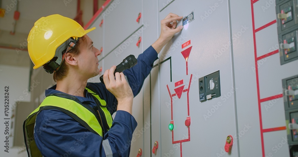 electricians electrical engineer in protective uniform wearing hard hat ...
