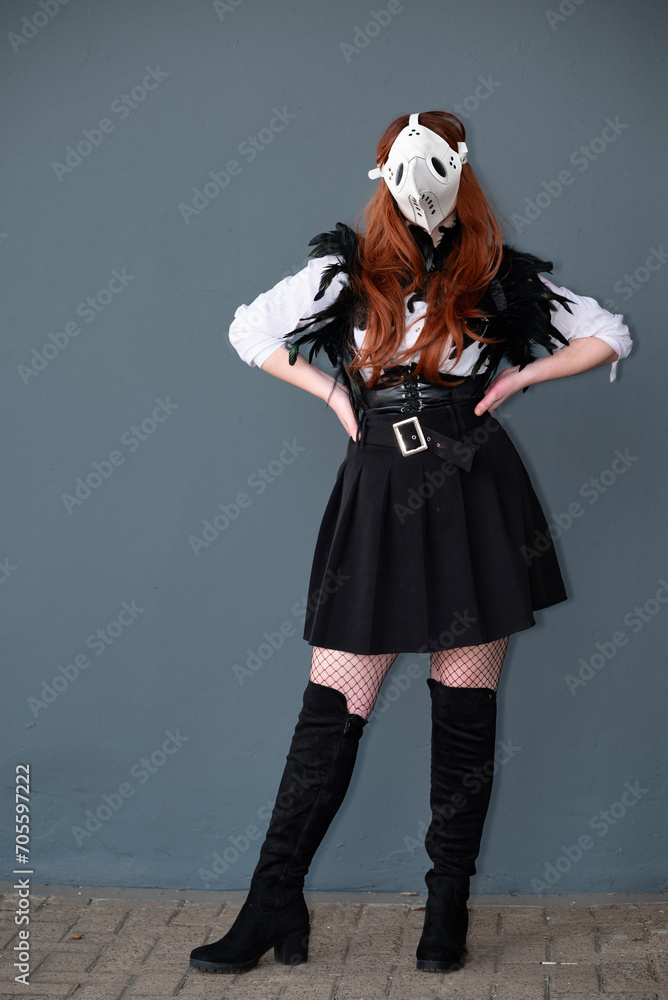 Female cosplayer dressed as a plague doctor with a white mask. Stock ...