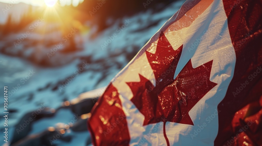 Canadian flag waving proudly against a stunning sunset backdrop ...
