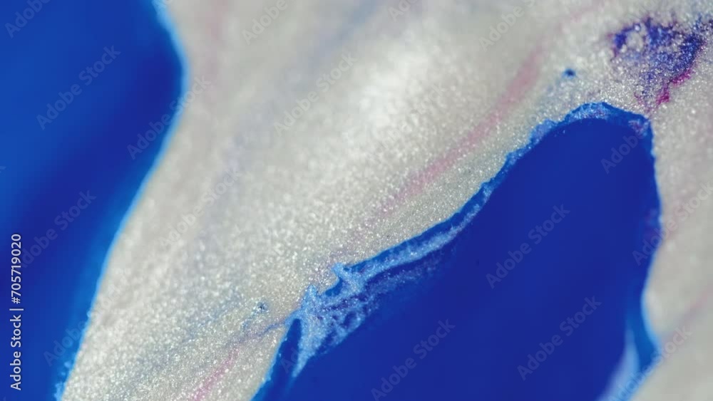 Glitter fluid texture. Paint water flow. Blur blue white pink color ...