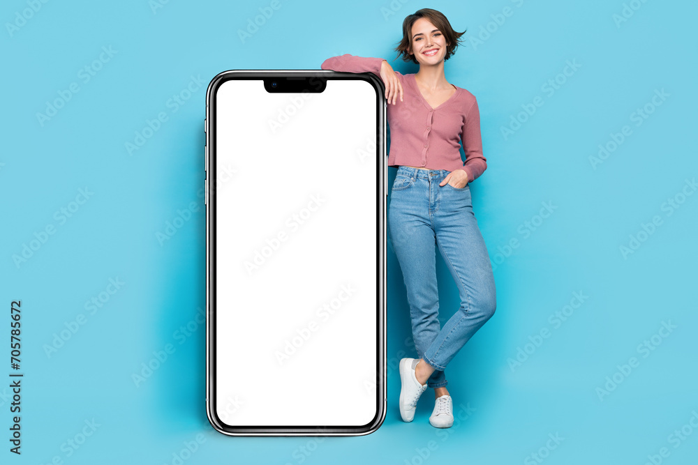 Full body photo young pretty lady stand posing near big smartphone ...