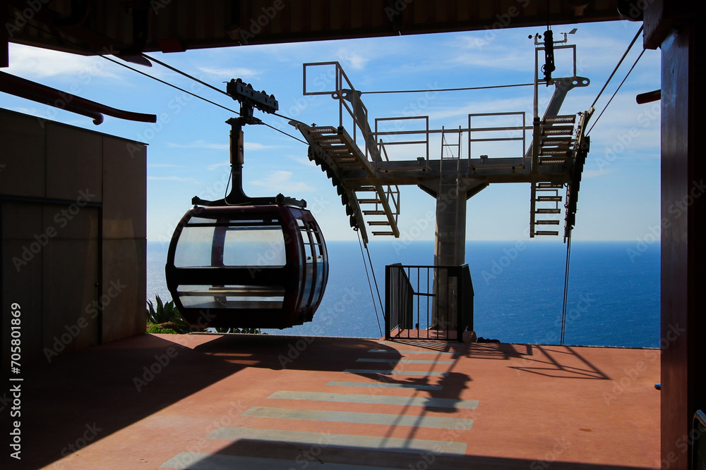 Cable-car gondola at the upper station of the Cristo Rei cableway on ...