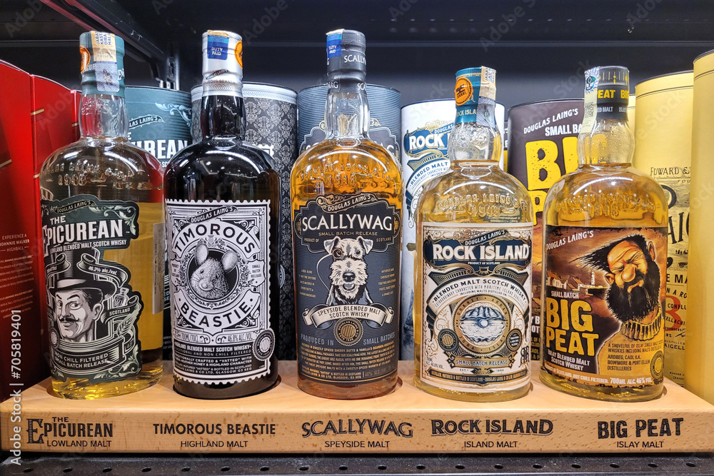 PENANG, MALAYSIA - 1 DEC 2023: Assorted whiskies are showcased on store ...