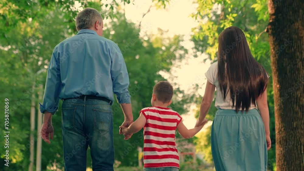 Mom, dad, child, full family. Happy family with son child walks ...