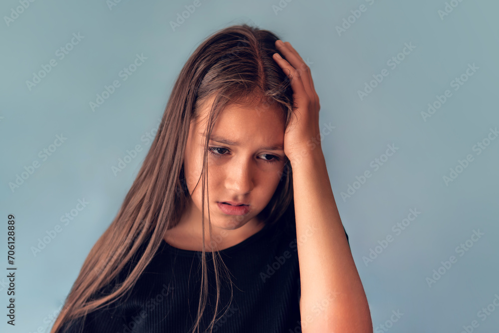 Closeup portrait stressed child, teenager girl hands on temples ...
