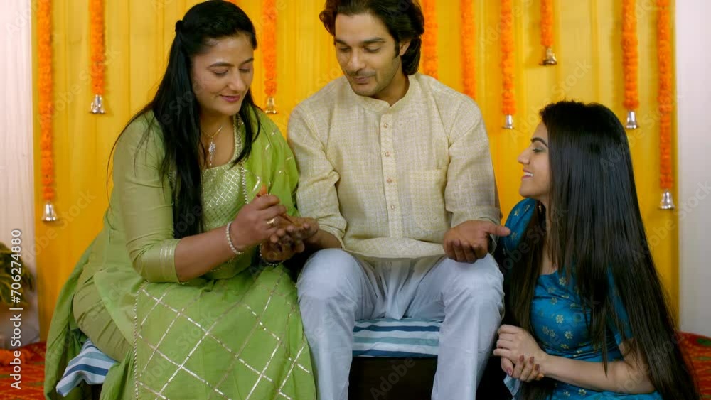 Loving family celebrating Indian wedding ceremony together - Mehendi ...