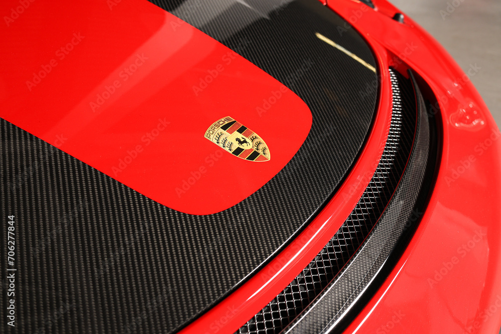 Porsche logo sign. Close up photo with the logo sign of a luxury speed ...