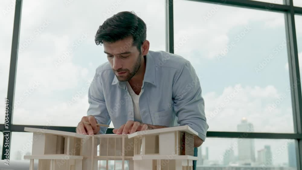 Smart civil engineer measure house model and writing at blueprint ...