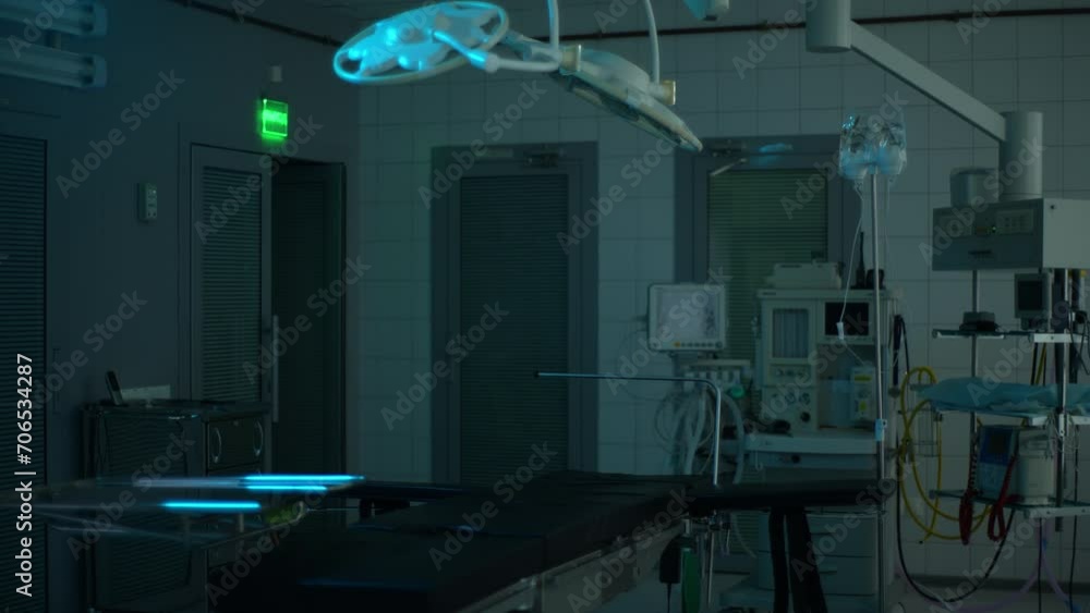 Empty dark operating room with innovative equipment. Modern surgical ...