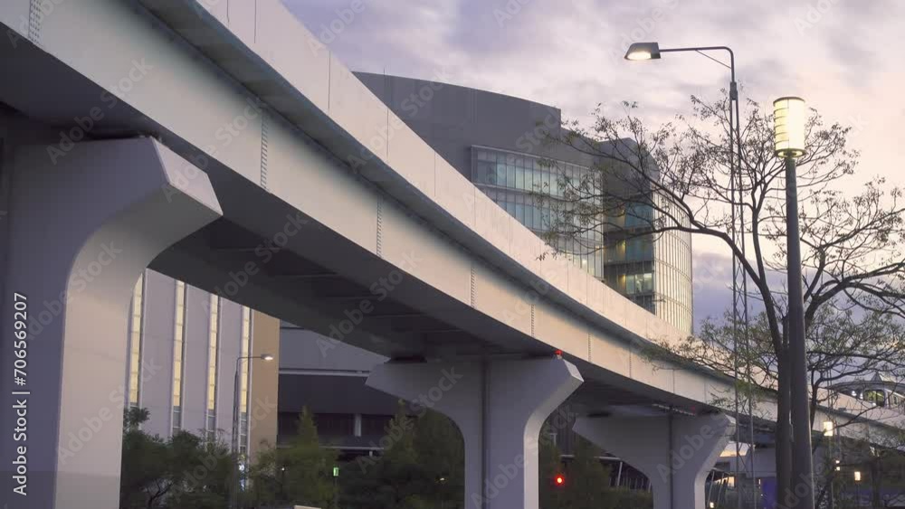 Complex land bridge design with highway, tracks and passing train of ...