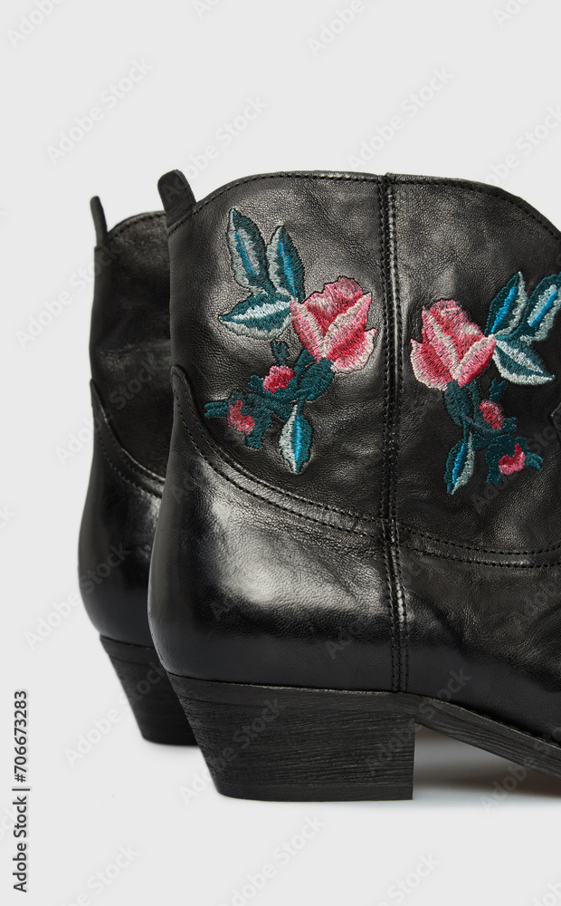 Back view on Black women's fashion cossack Chelsea Cowboy boot isolated ...