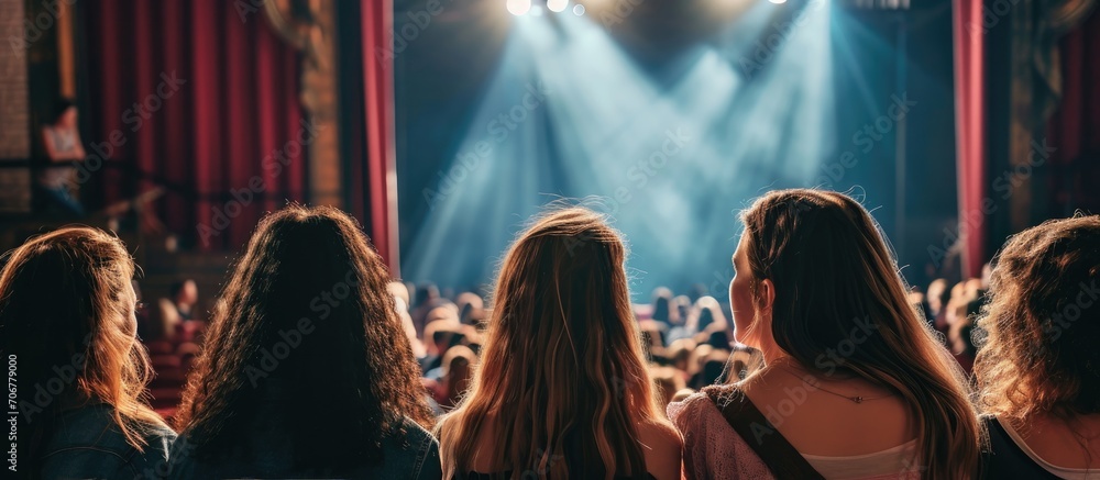 trio of female performers on stage about to begin their act. with copy ...
