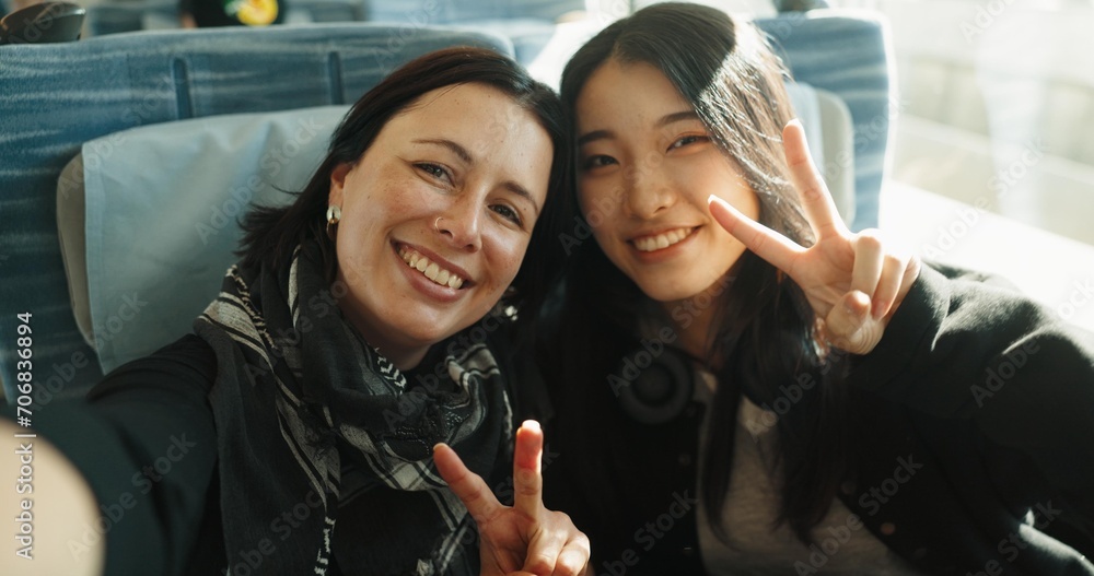 Women, peace sign and selfie on train, portrait and japan public transportation on metro bullet ...