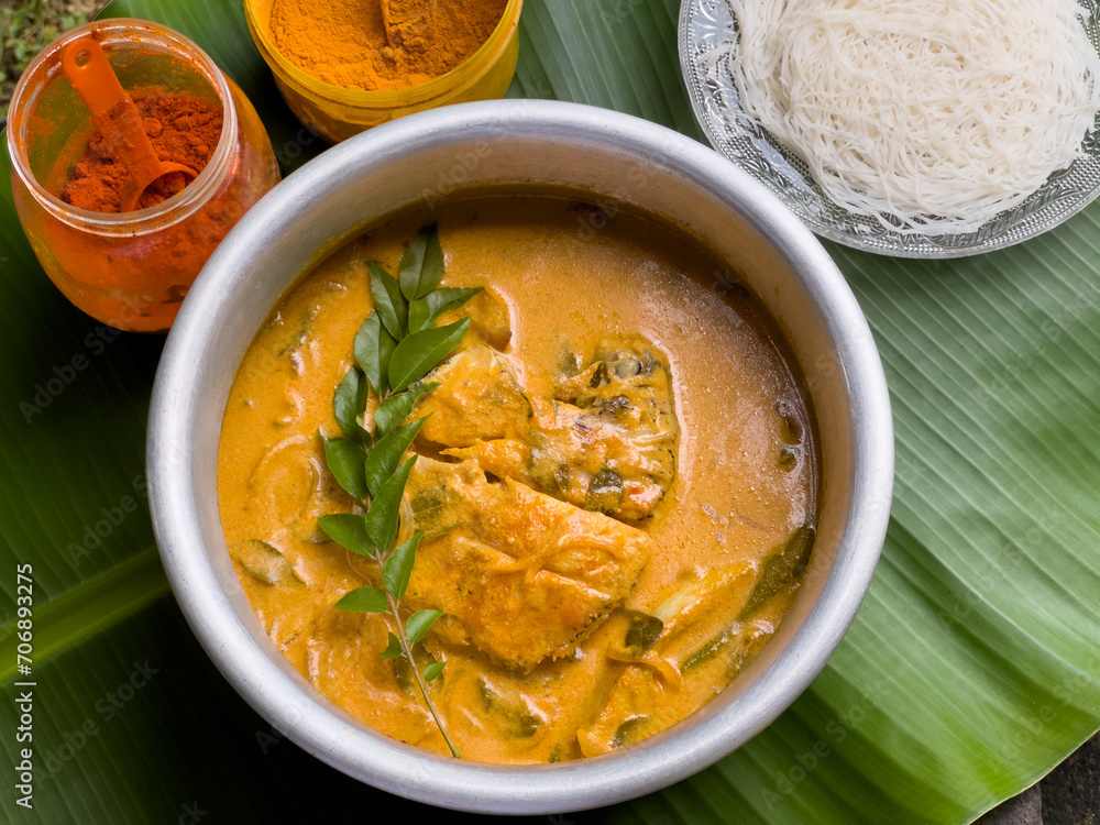 Kerala fish curry coconut milk gravy , cooking spicy Goan fish curry ...