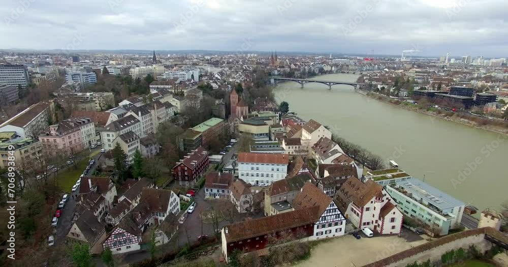 Elevate your perspective with an aerial view of Basel, tracing the Rhine's charming housing ...