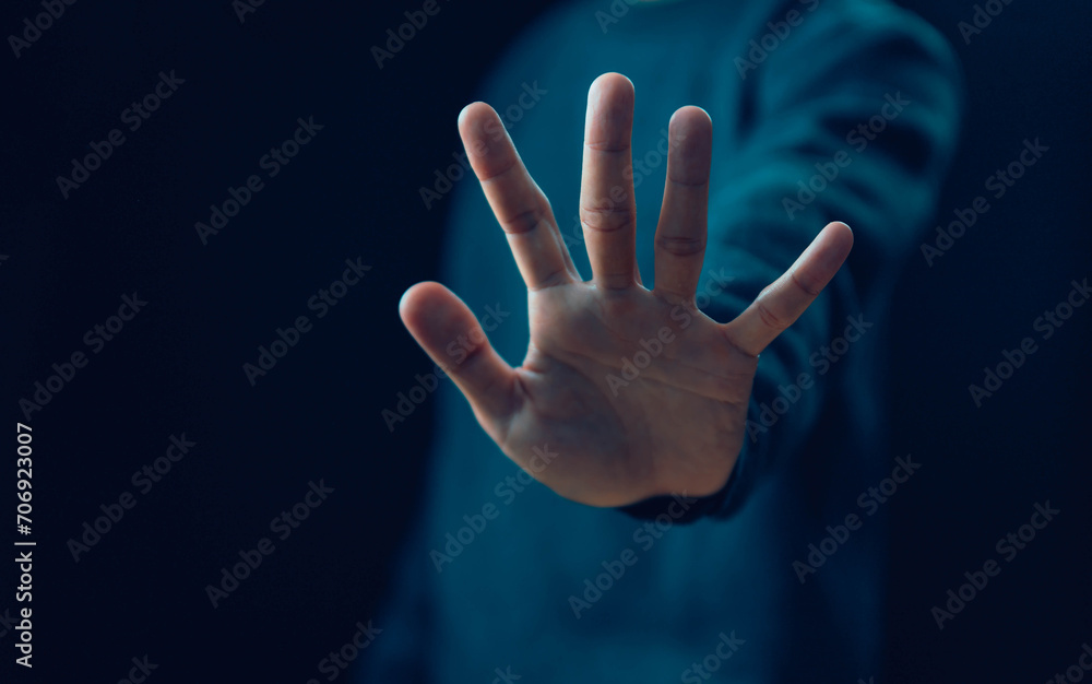 person's hand showing palm gestures stop, concept violence, warning ...