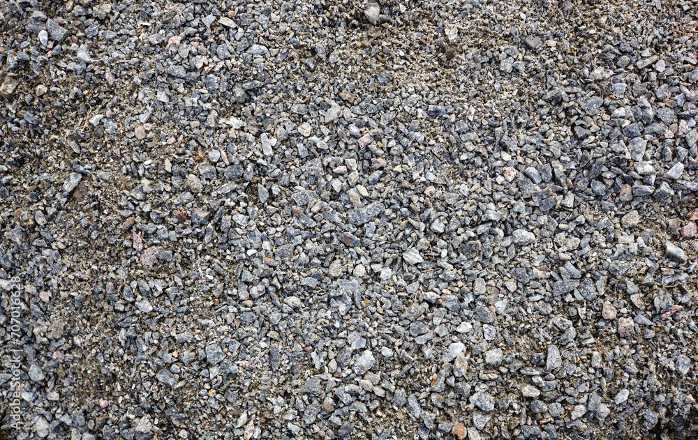 Grey ground stone rubble road background. Natural gray granite ...