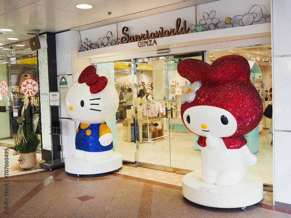 TOKYO, JAPAN - January 6, 2024: A pair of Hello Kitty statues at the ...