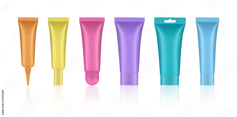 Set of multicolored cosmetic tubes. Orange, yellow, pink, purple and ...