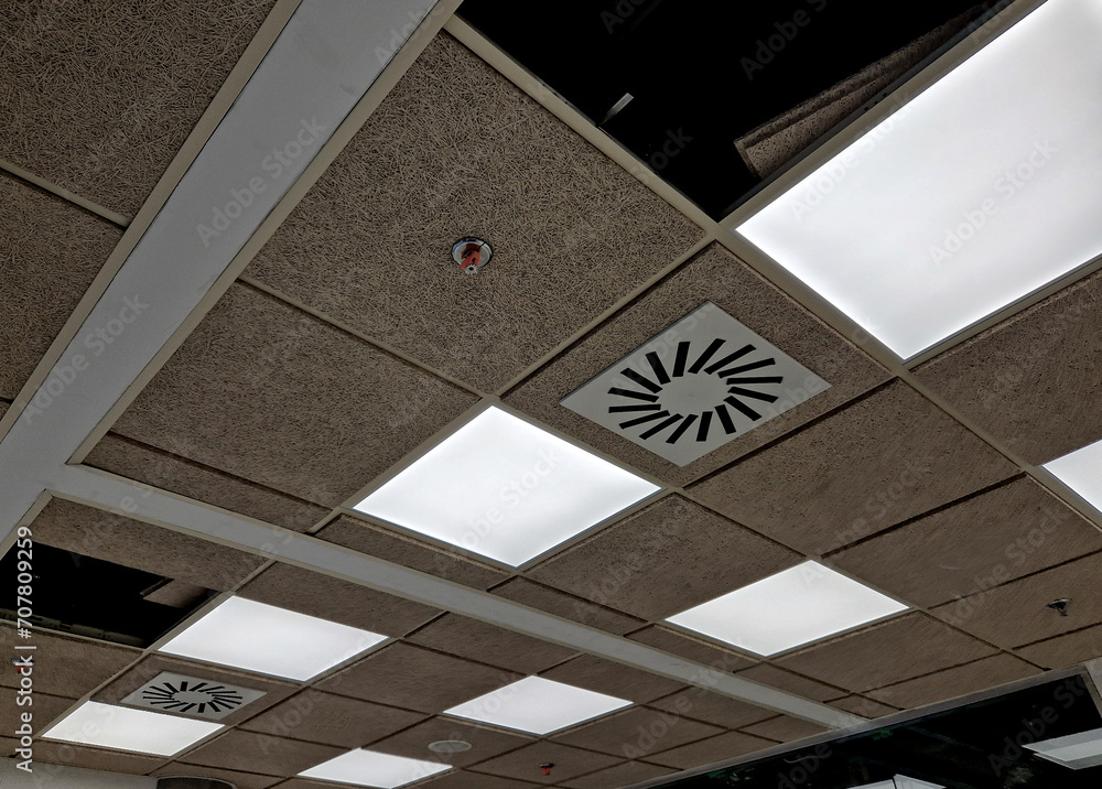 modular ceiling with soffit boards, lights that are connected from a ...