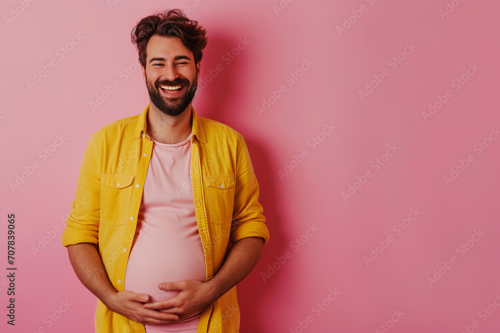 pregnant trans man with a big belly on a pastel pink background Stock ...