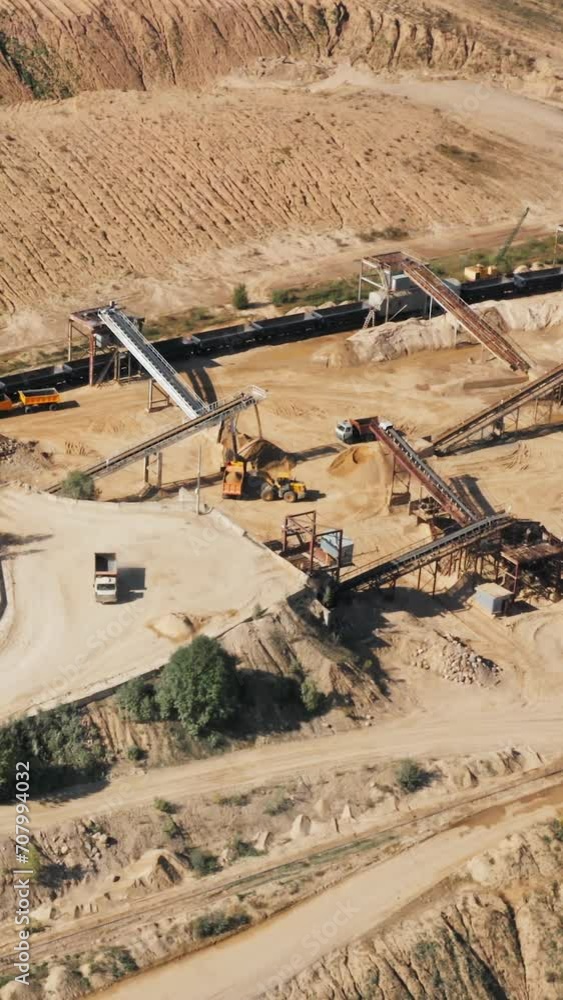 Stockvideon Vertical shot aerial view of sand quarry, industrial ...