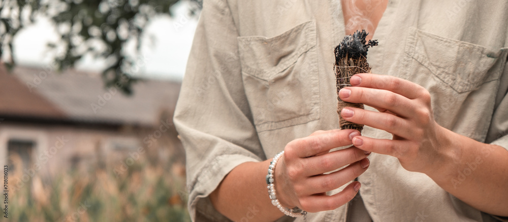 Woman Inhaling Incense Smoke During Meditation.Ground level of relaxed ...