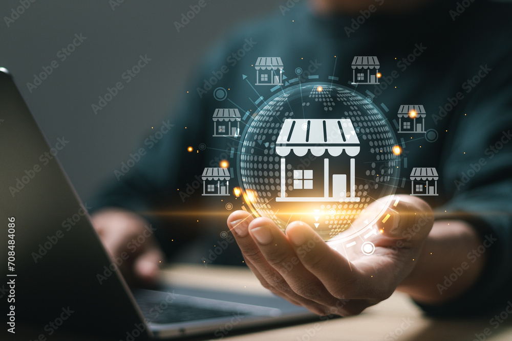 Franchise business concept, Businessman hold virtual globe with ...