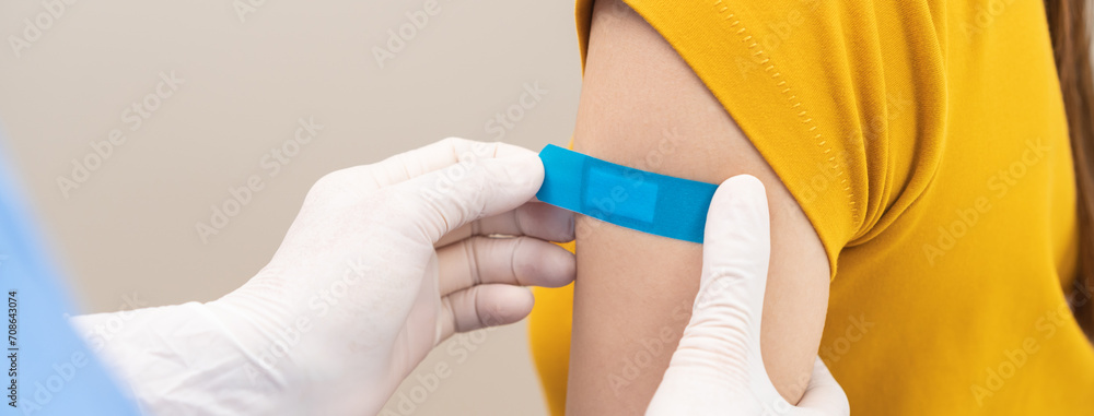 Vaccination coronavirus, hand of nurse apply plaster, bandage after ...