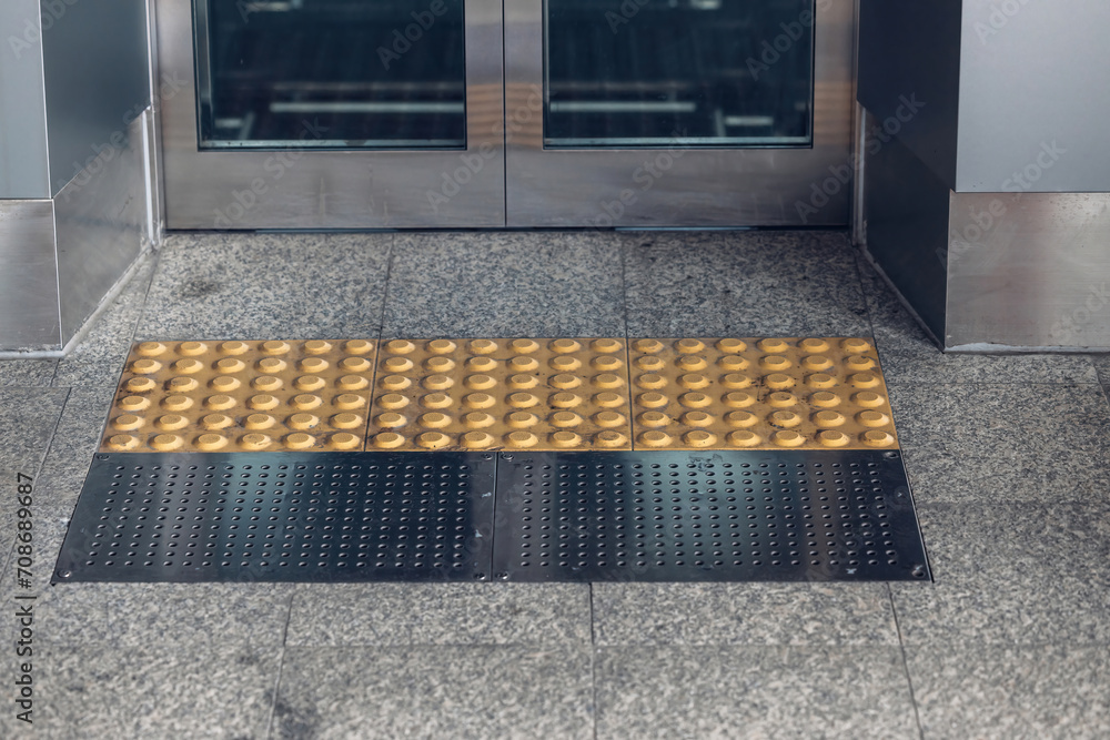 Concrete ramp way with stainless steel handrail for support wheelchair ...