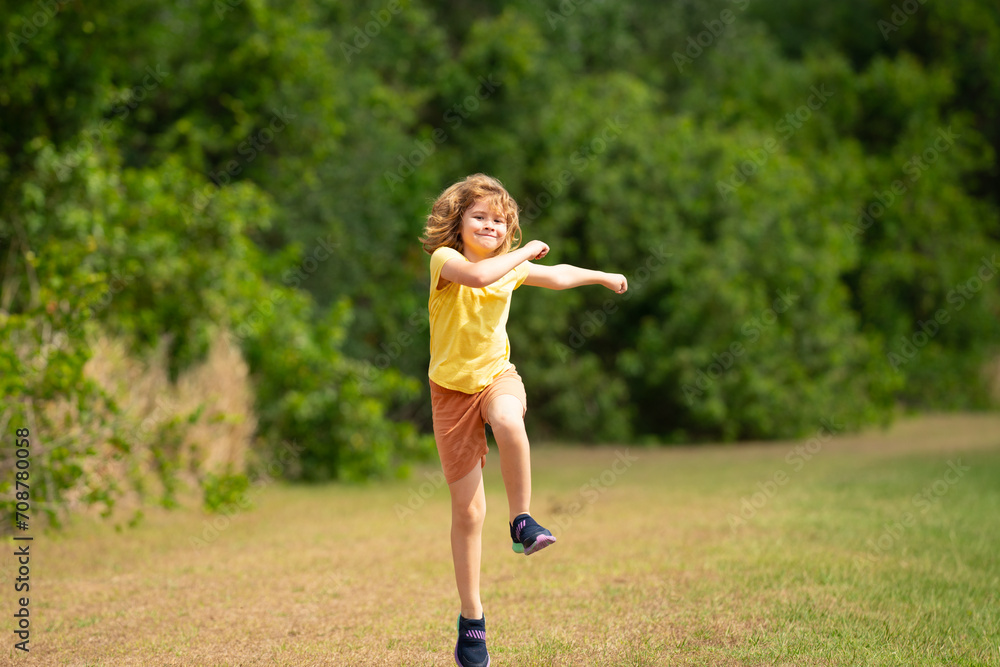 Excited Kid running in street. Amazed child enjoy run. Happy little boy ...