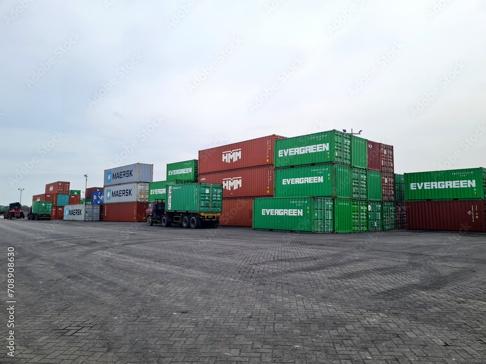 stack of container boxes in a depot or container yard. Colorful ...