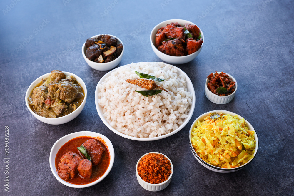 Kerala special food sadhya in banana leaf plate with Chicken fry Duck ...