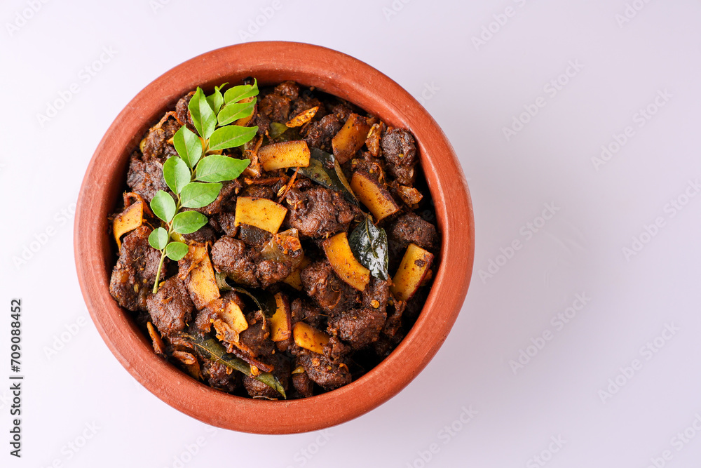 Spicy red beef fry curry and brown rice South Indian dish Kerala, India ...