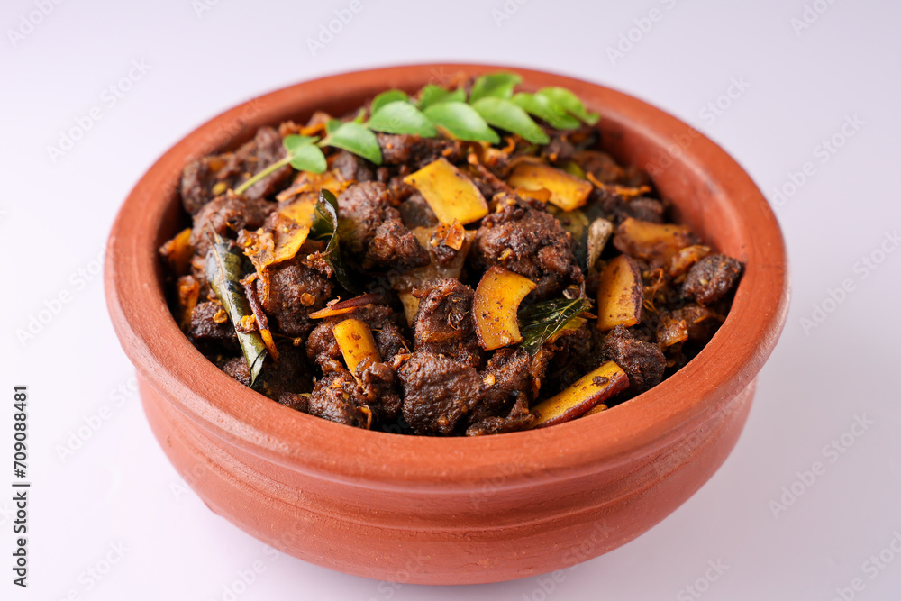 Spicy red beef fry curry and brown rice South Indian dish Kerala, India ...